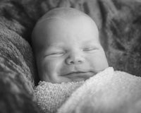 baby smiling while sleeping caption